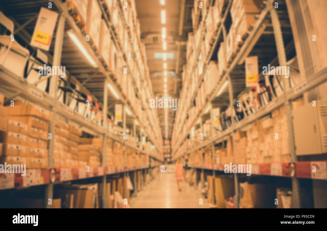 Blur image of a warehouse with multi layer shelves background - vintage ...