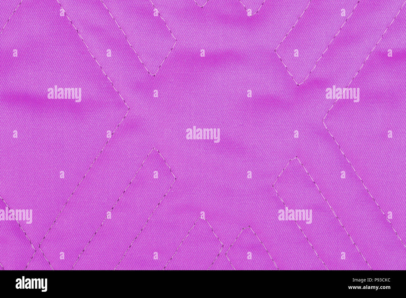 Purple quilted fabric texture with geometric pattern Stock Photo - Alamy