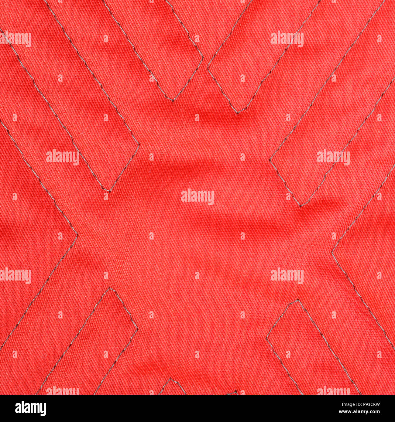 Red quilted fabric texture with geometric pattern Stock Photo - Alamy