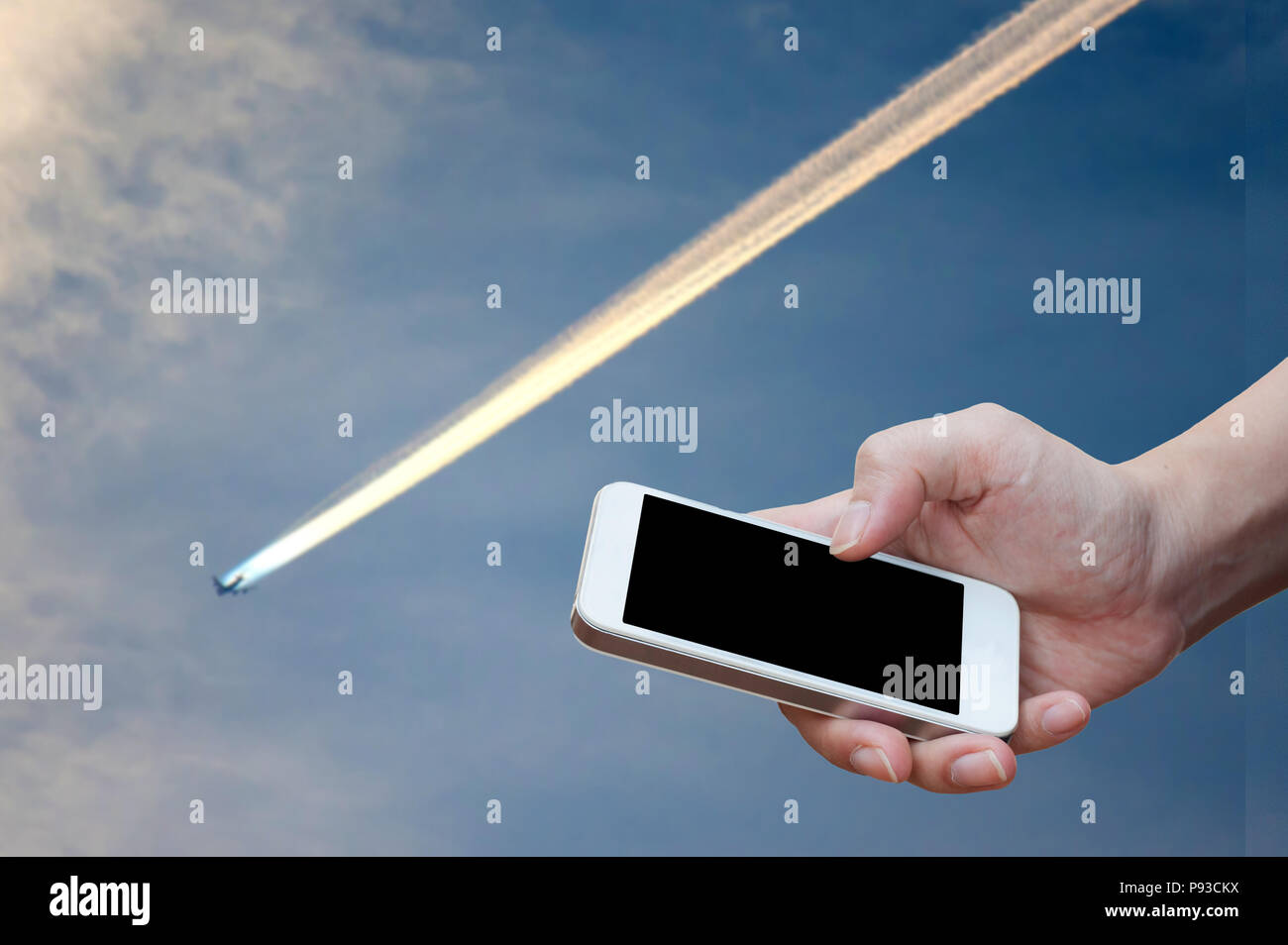 Man's hand shows mobile smart phone and blurred background - mockup ...