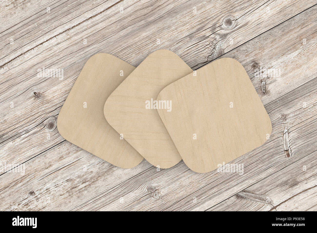 Cardboard square coasters. Isolated on wood background. 3d render Stock ...