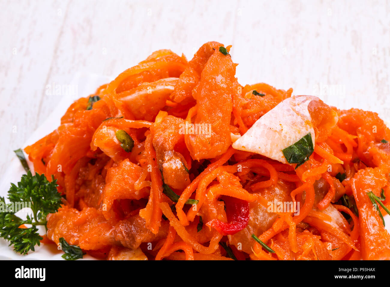 Pickled carrot with fish in the bowl Stock Photo - Alamy