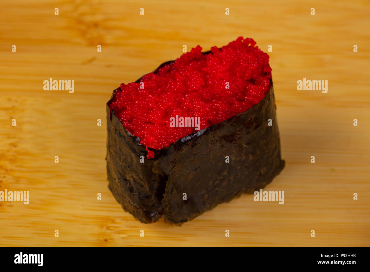 Delicious red masago sushi with caviar Stock Photo - Alamy