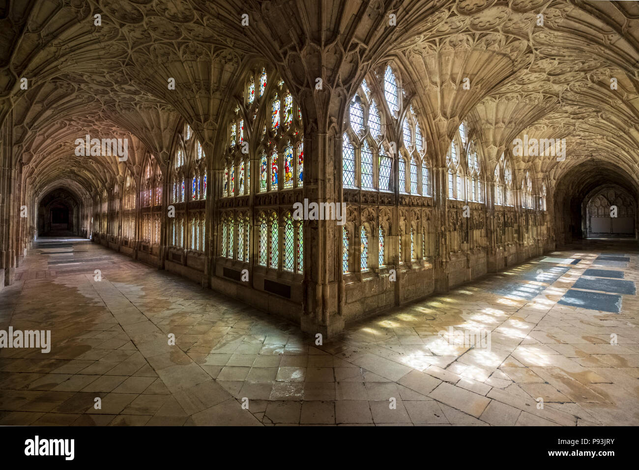 The vaulted ceiling and corridors of the Cloisters at Gloucester ...