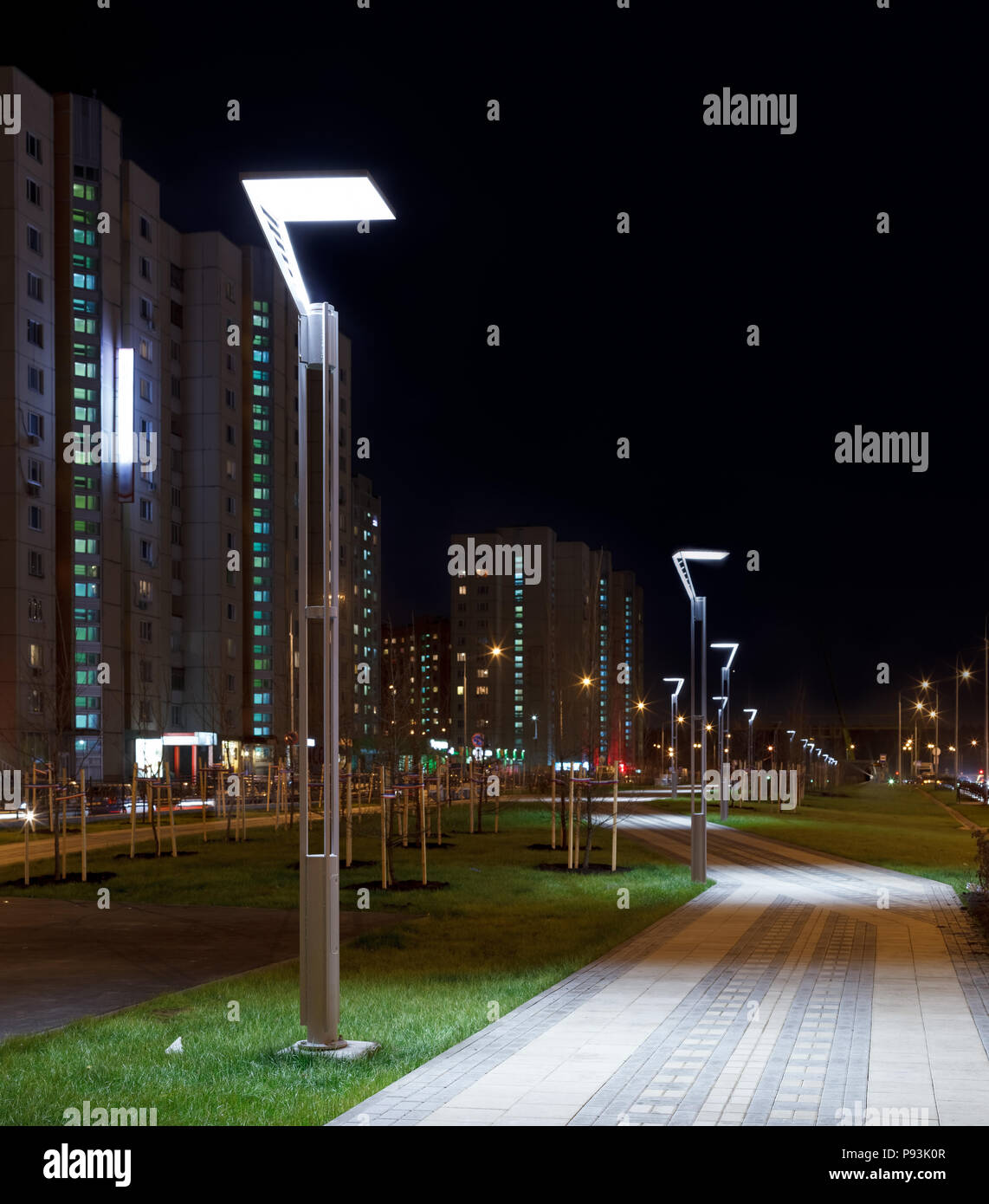 Street lights on boulevard and illuminated subway staiton Stock Photo ...