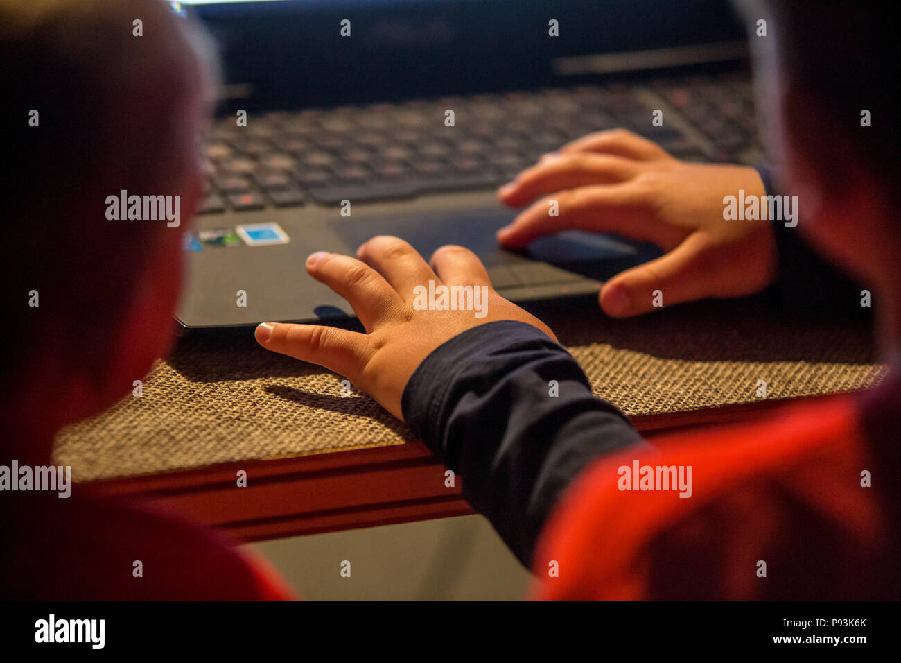 Children hands working with computer Stock Photo - Alamy