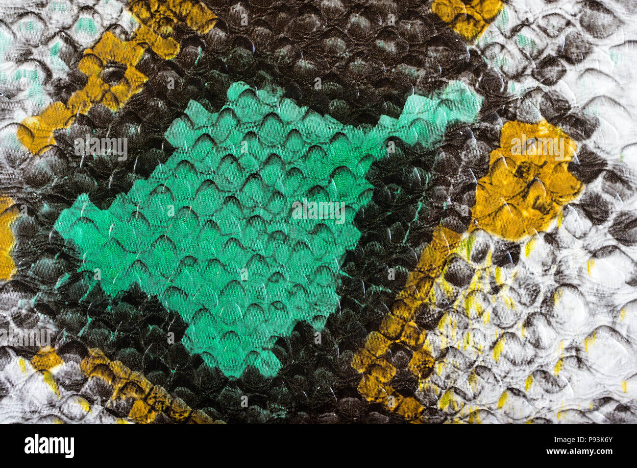 Multicolored faux leather snake Python texture for background. Close up ...