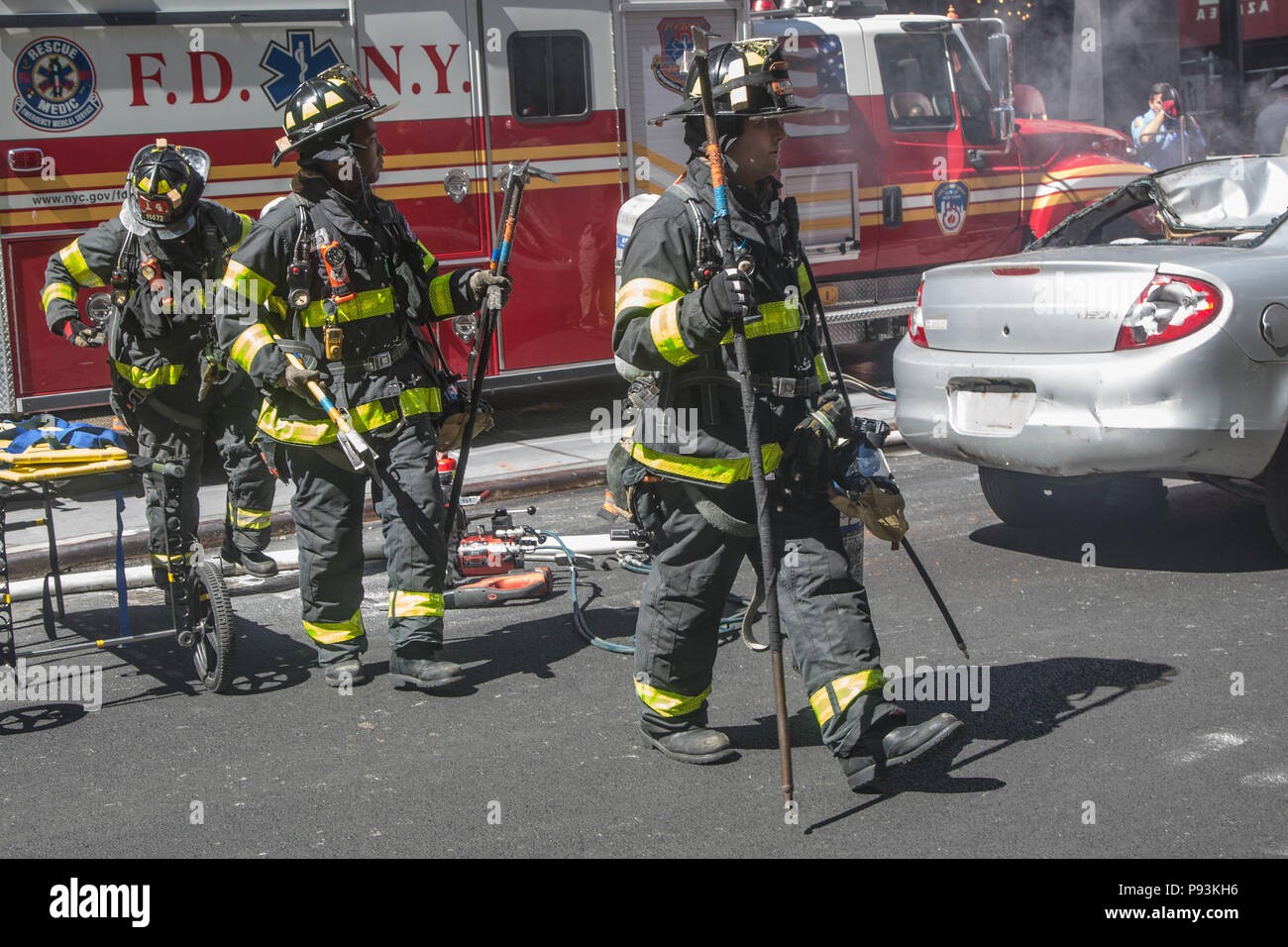 Firefighters with the New York City Fire Department (FDNY) train ...