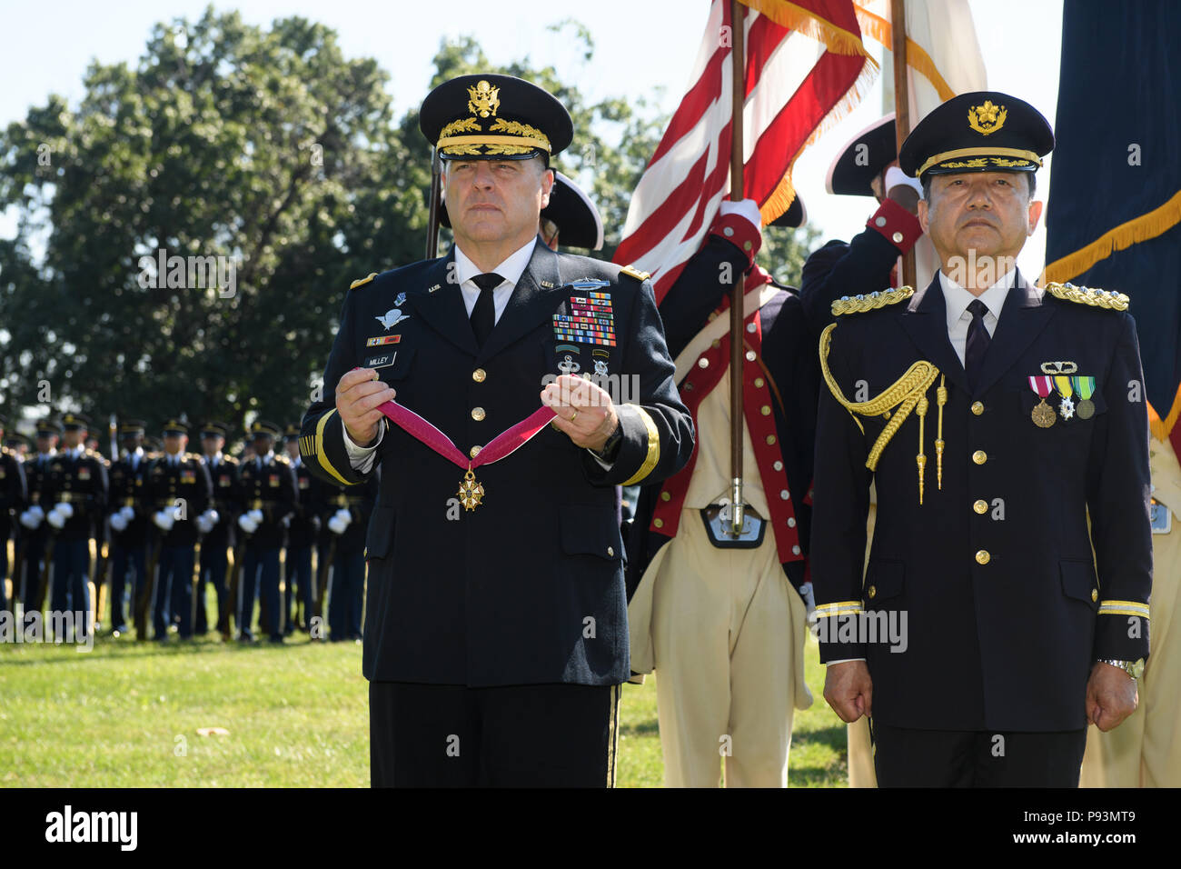 Chief of Staff of the U.S. Army Gen. Mark A. Milley, left, presents Gen ...