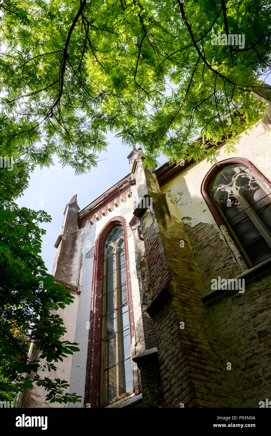View on the ruined ancient abandoned German Catholic Church made of ...