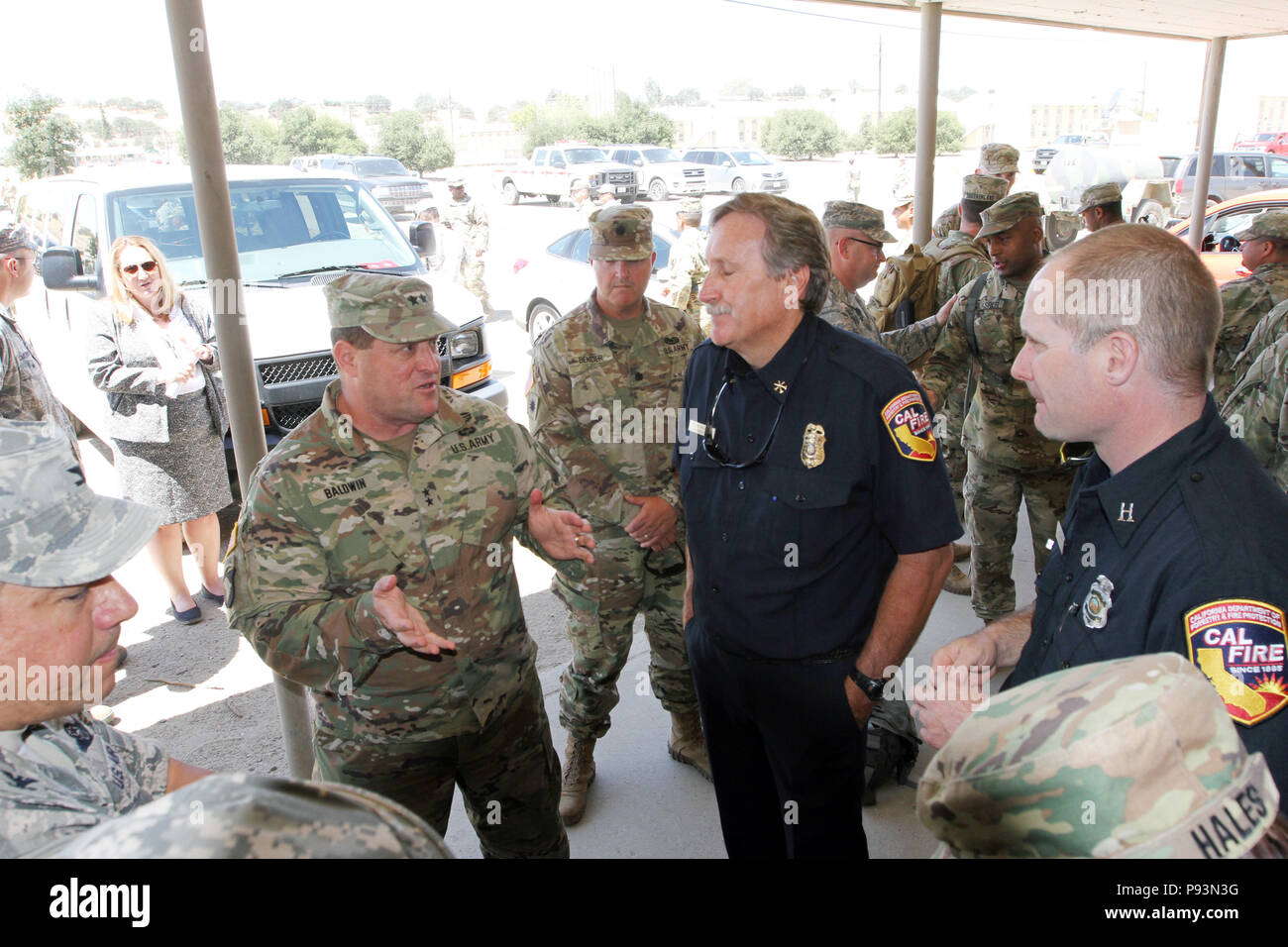U.S. Army Maj. Gen. David Baldwin, left, adjutant general of the ...