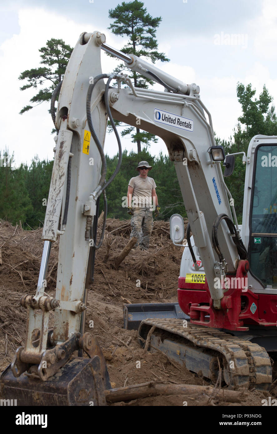U.S. Air Force Staff Sgt. Justin Hudecheck, a member of the 166th Civil ...
