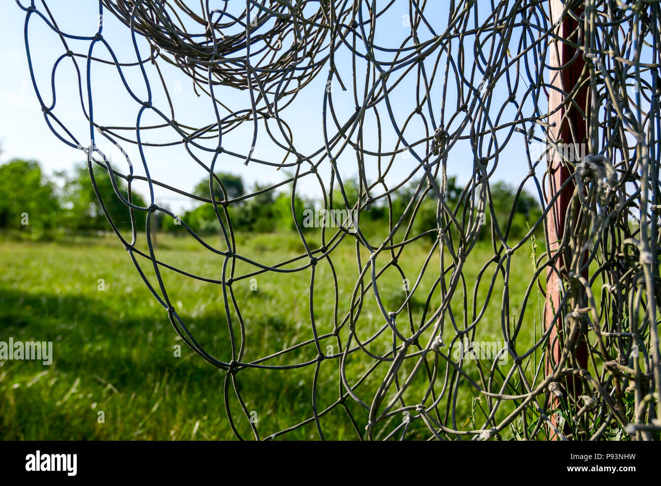 Torn soccer net hi-res stock photography and images - Alamy