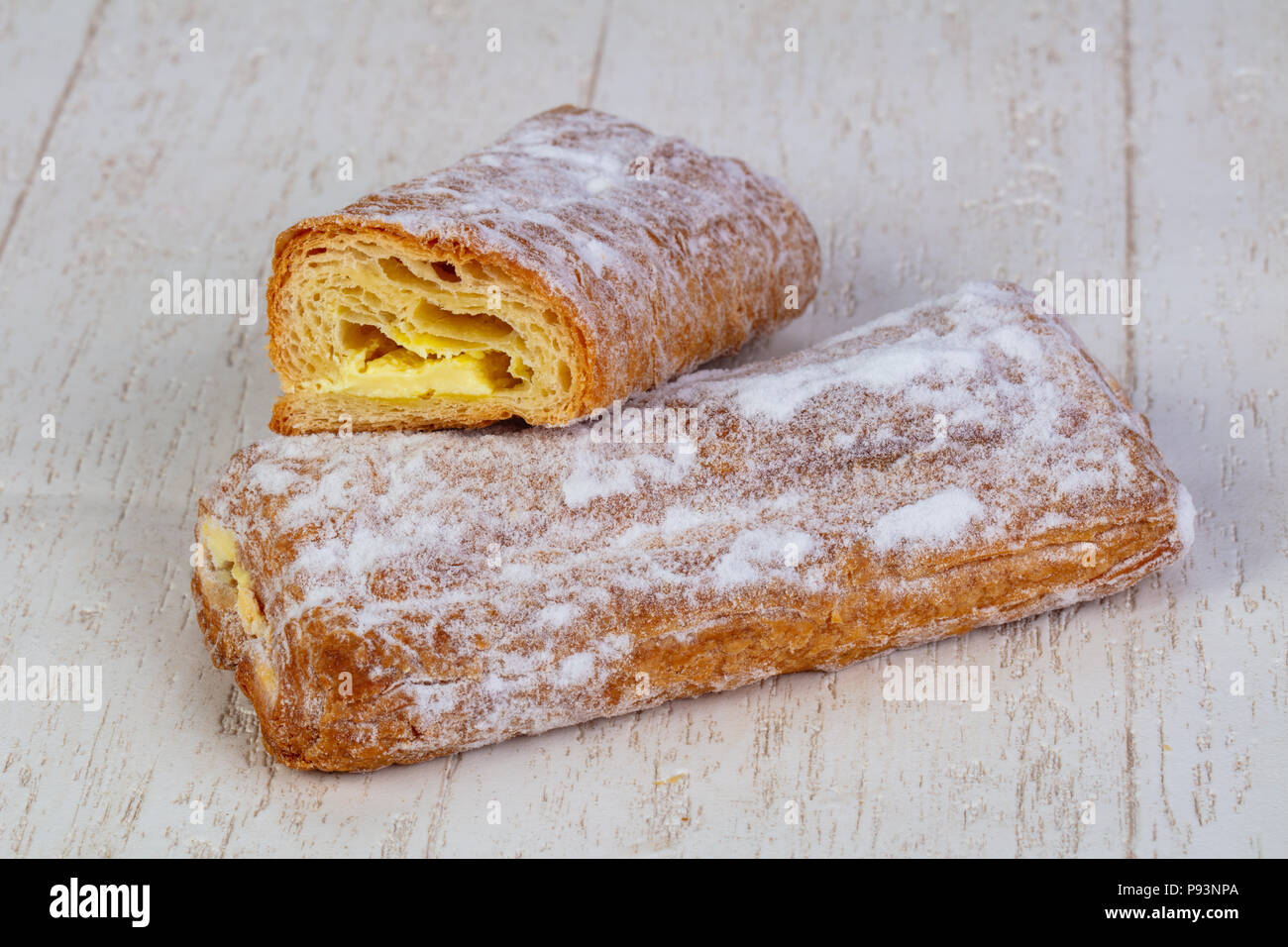 Delicious puff pastry strudel with jam filling Stock Photo - Alamy