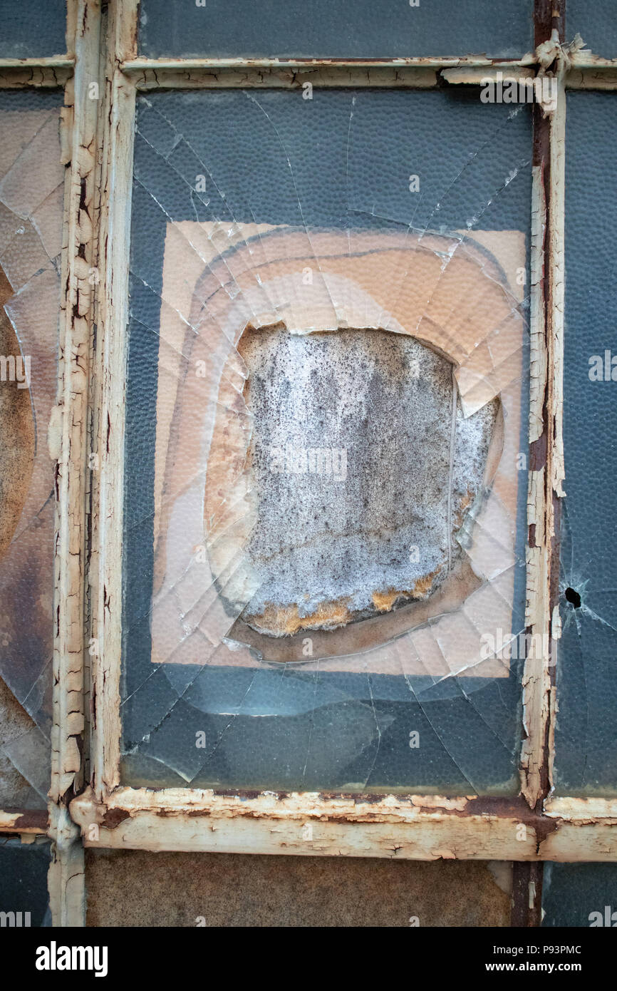 Broken window in an old building Stock Photo - Alamy