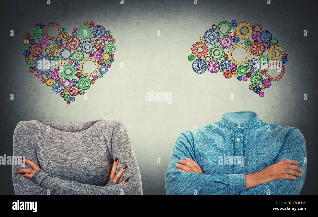 Choose between heart and mind. Incognito man and woman with crossed ...