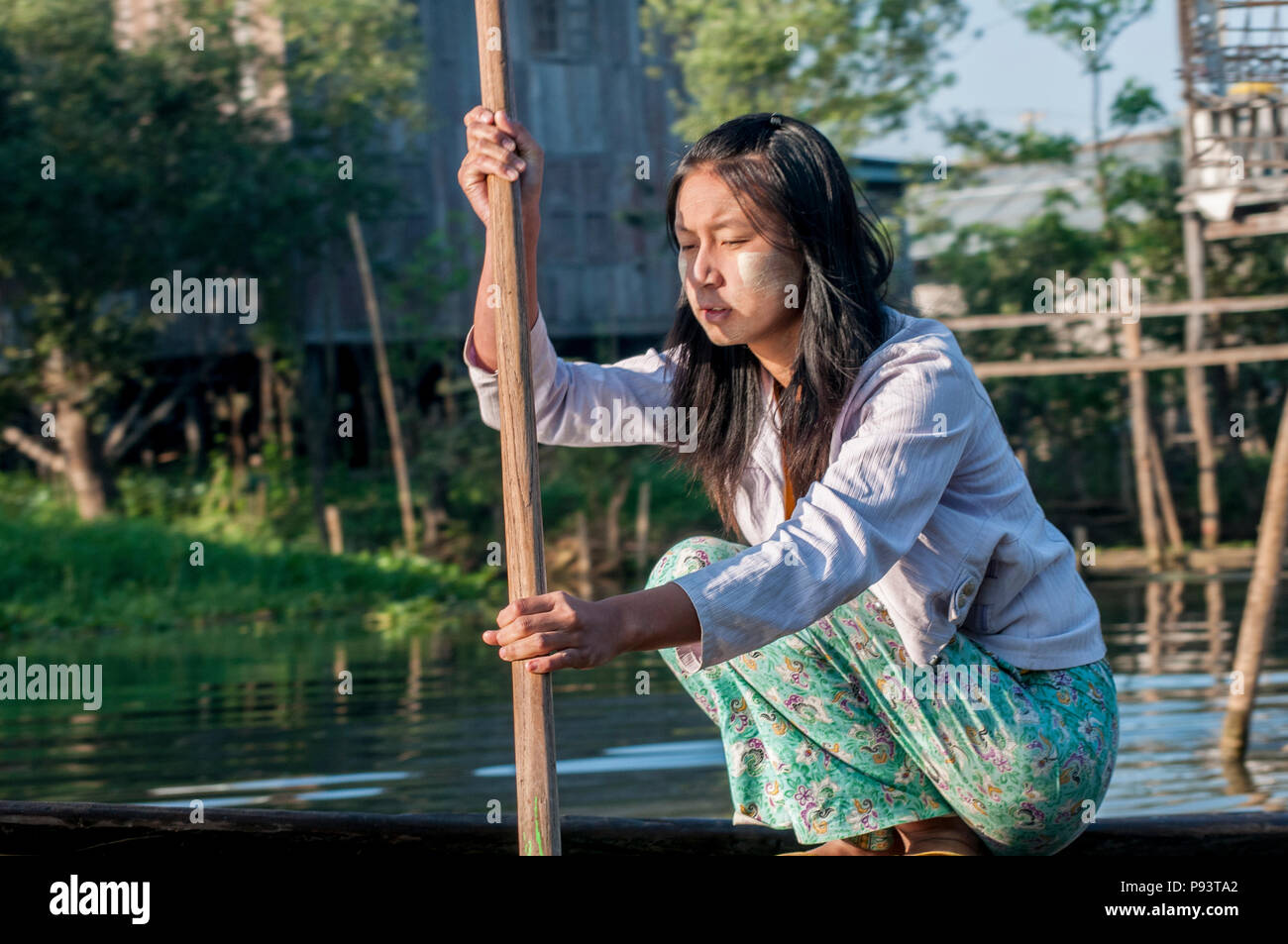 Burmese Lady at Floating Village Stock Photo - Alamy