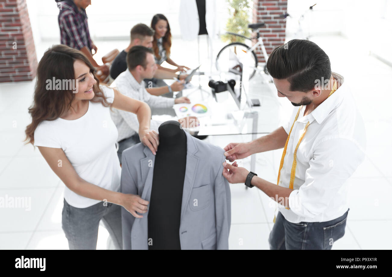 designers working on new models of clothes Stock Photo - Alamy