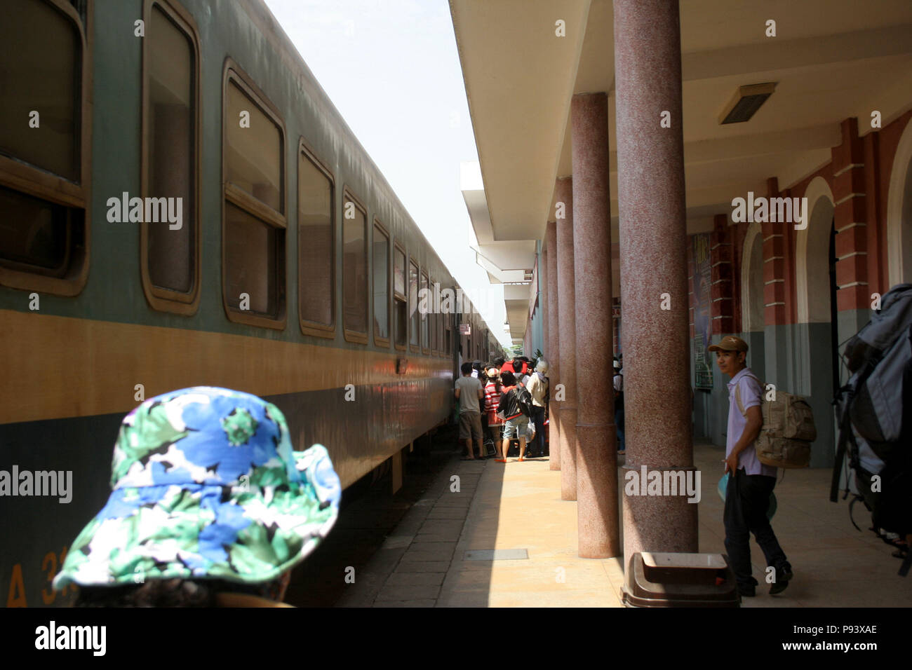People Boarding Vietnamese Train at Hue Station, Vietnam Stock Photo ...
