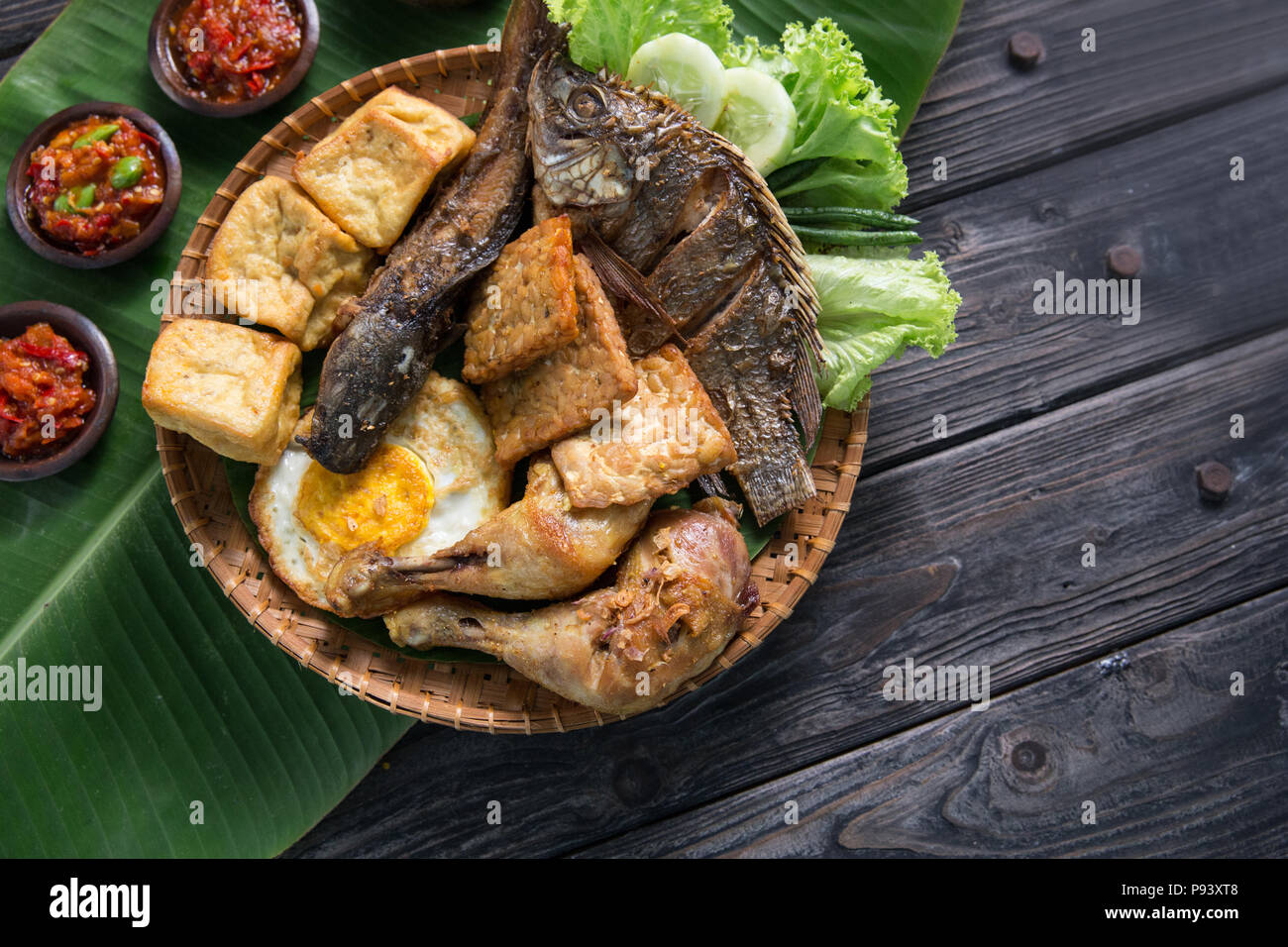 penyetan. indonesian traditional cuisine. fast food served with various ...