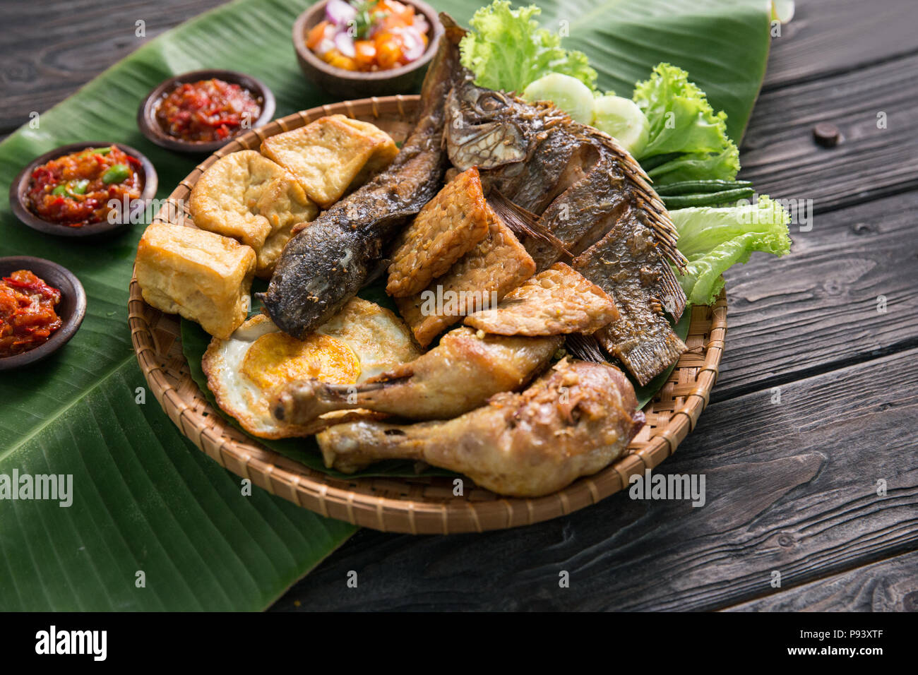 penyetan. indonesian traditional cuisine. fast food served with various ...