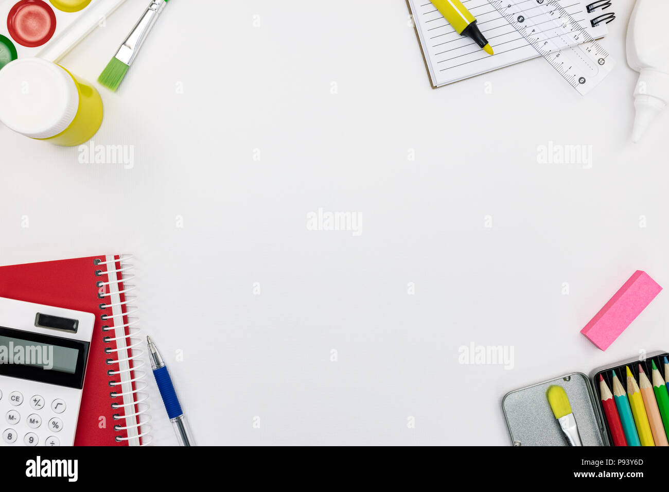 variety of school supplies and tools on white desk background. school ...