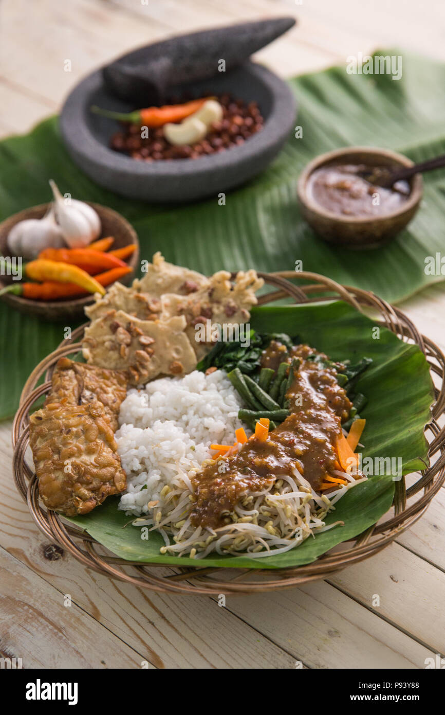 nasi pecel. vegetable with peanut sauce. indonesian tradtional food ...