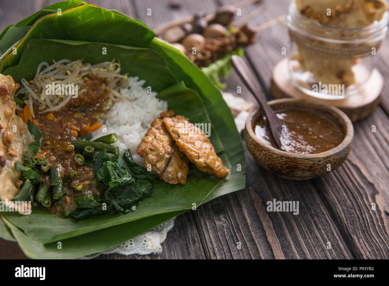 nasi pecel. vegetable with peanut sauce. indonesian tradtional food ...