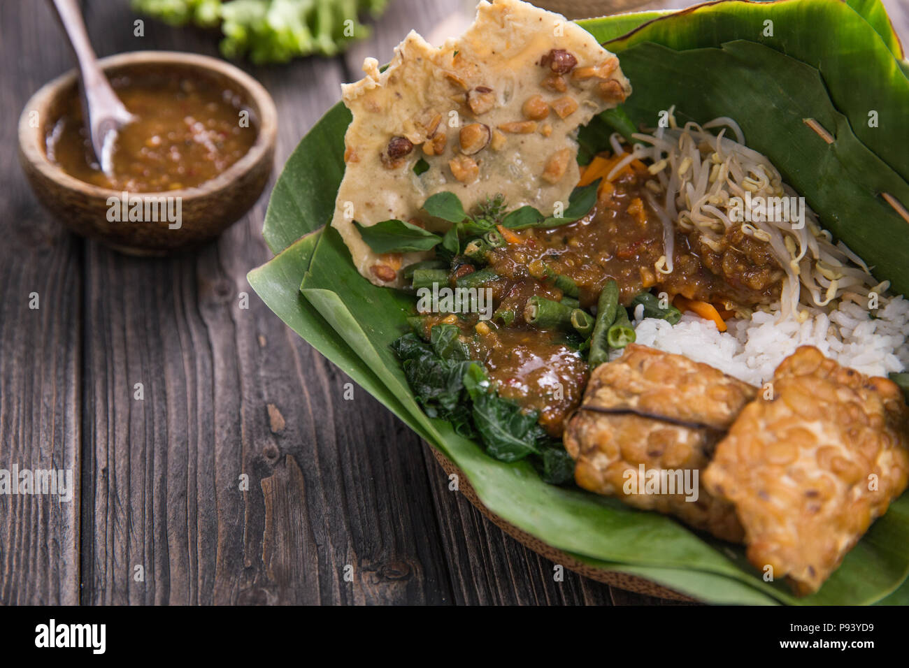 nasi pecel. vegetable with peanut sauce. indonesian tradtional food ...