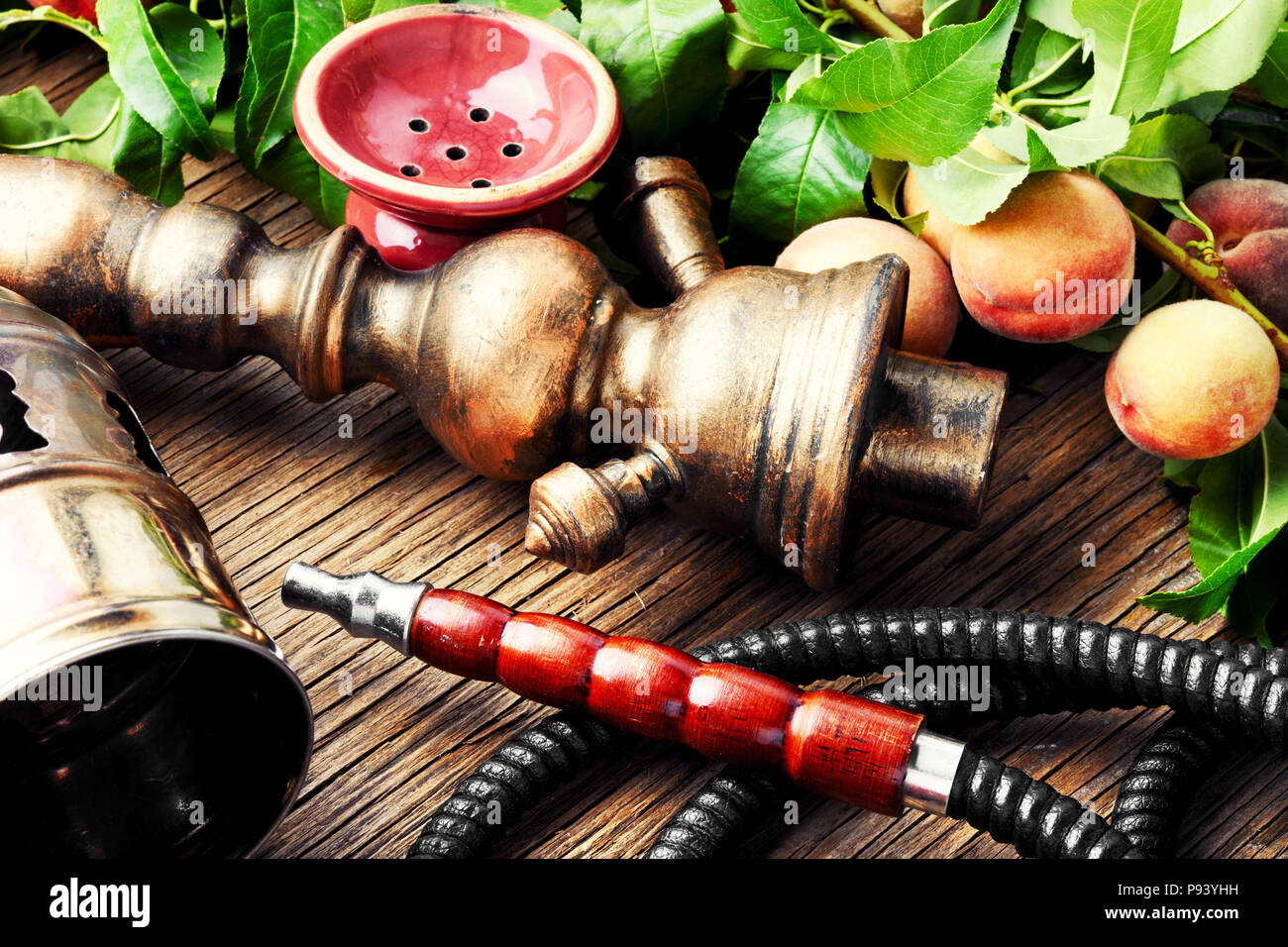 Hookah for smoking with the aroma peach.Peach shisha Stock Photo - Alamy