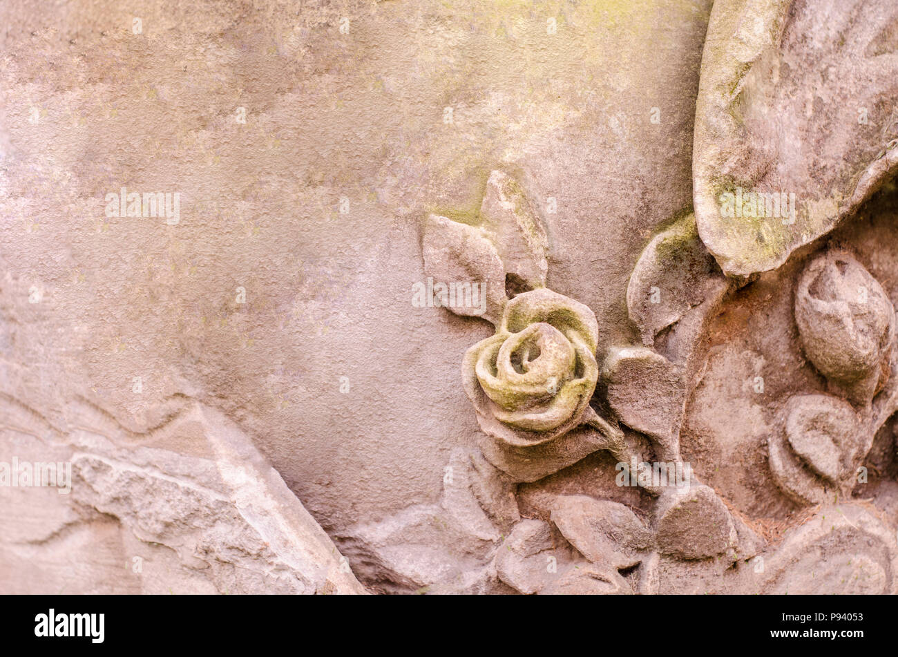 Medieval stone texture with a handmade rose. A fragment of Italian ...