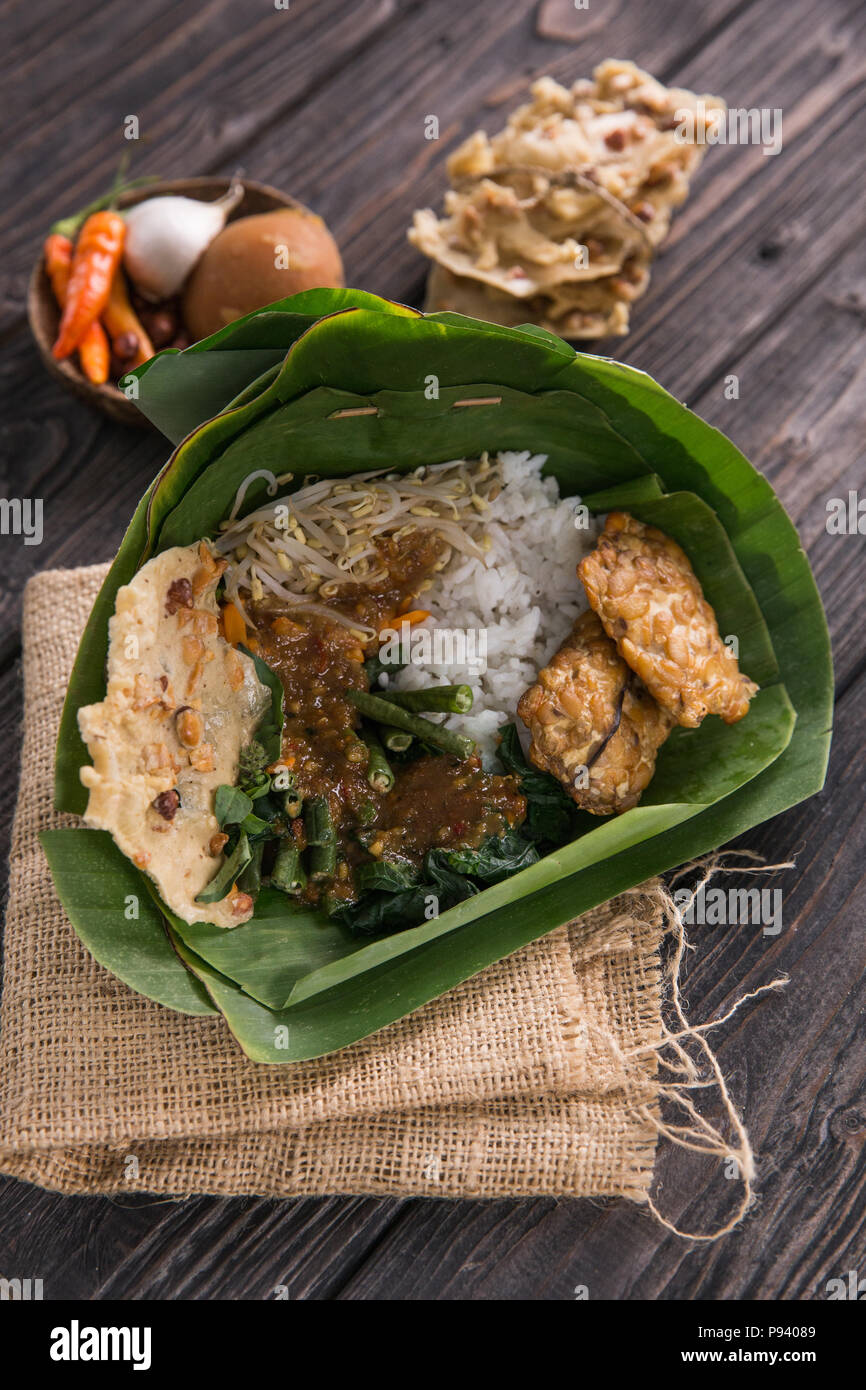 traditional indonesian culinary food pecel with banana leaf Stock Photo ...