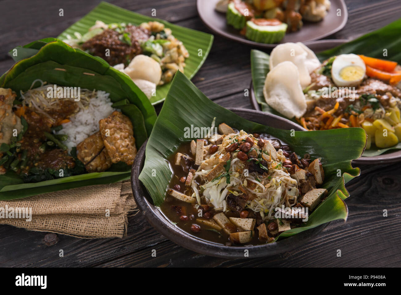 traditional indonesian culinary food served in banana leaf Stock Photo ...