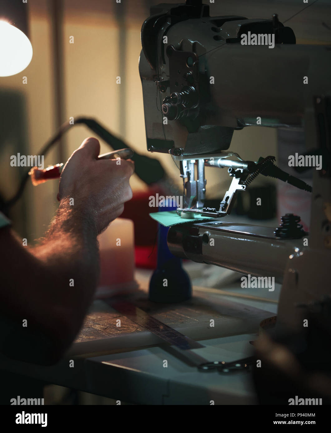 Sewing on the sewing machine - Working close up Stock Photo - Alamy