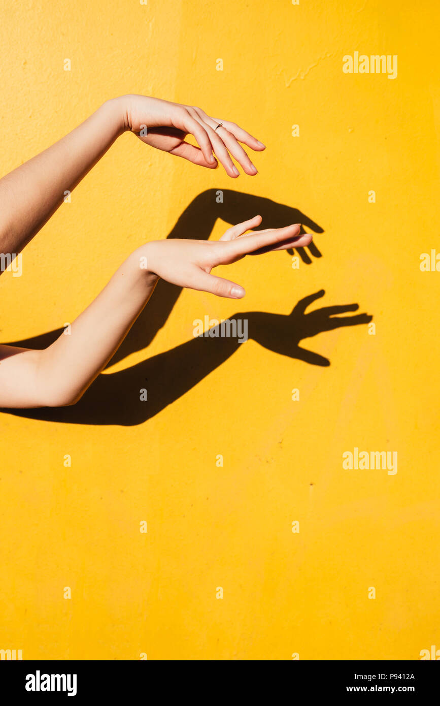 Female hand. Summer girl teen dancing under direct sun light. Art ...
