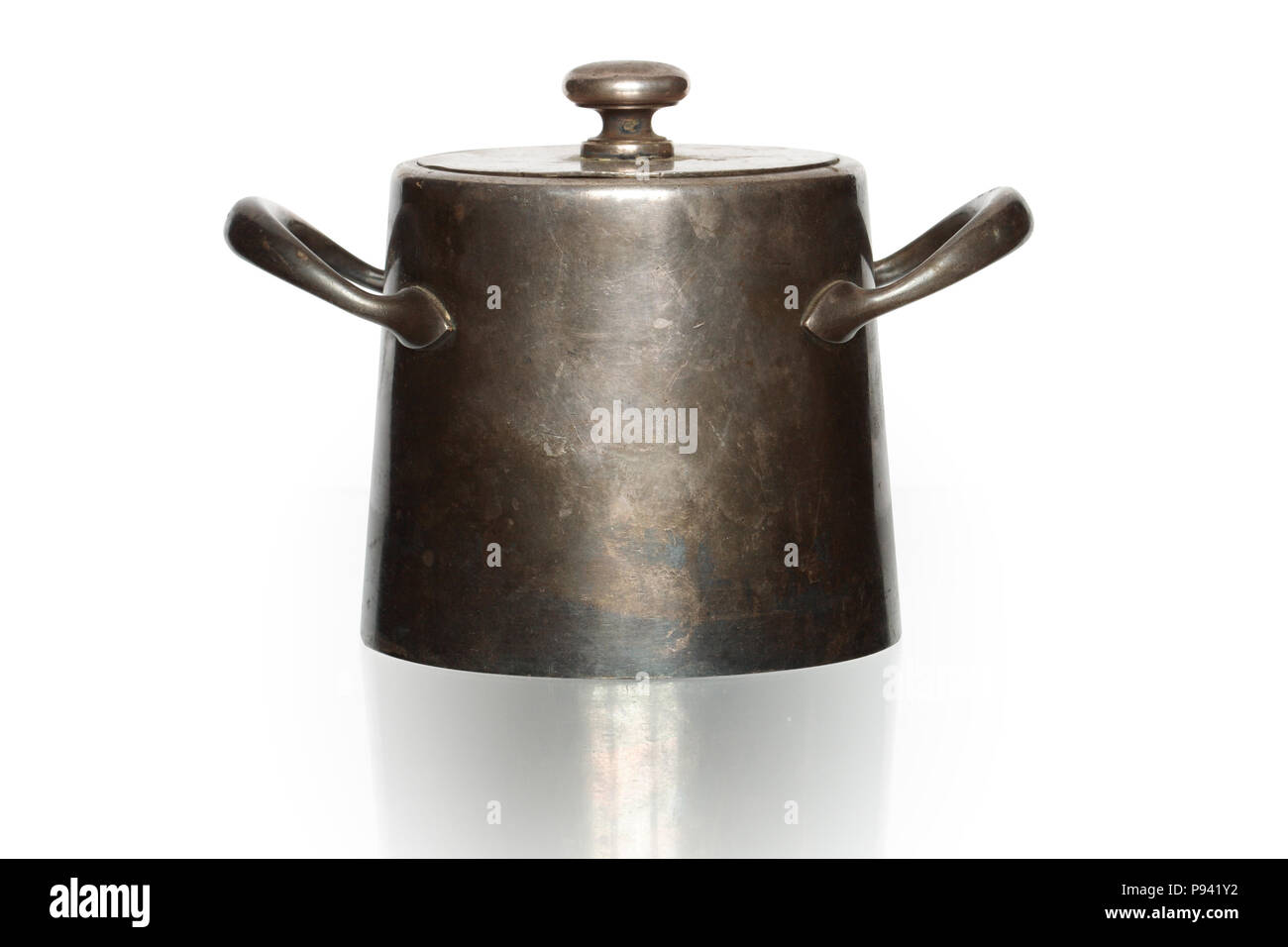 Ancient bronze sausepan isolated on white background with clipping path ...