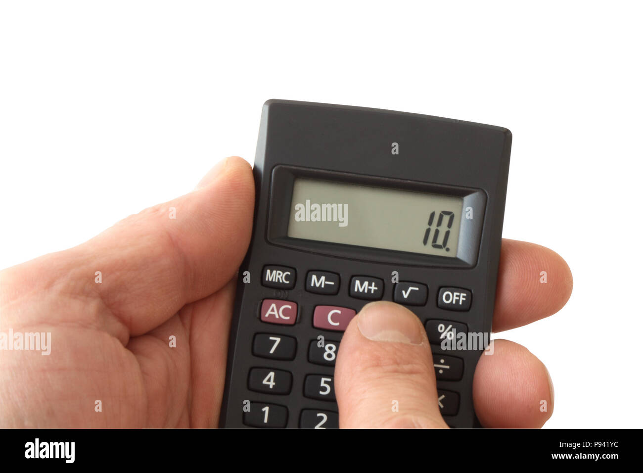 Close-up of hands with a calculator isolated on white background with ...