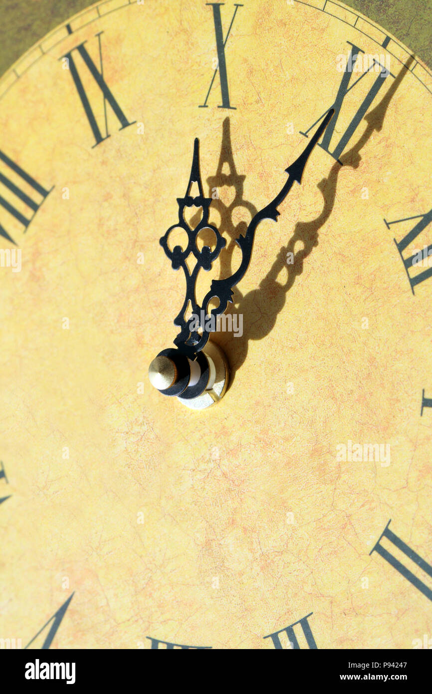 Nice background with close-up of old yellow clock dial Stock Photo - Alamy