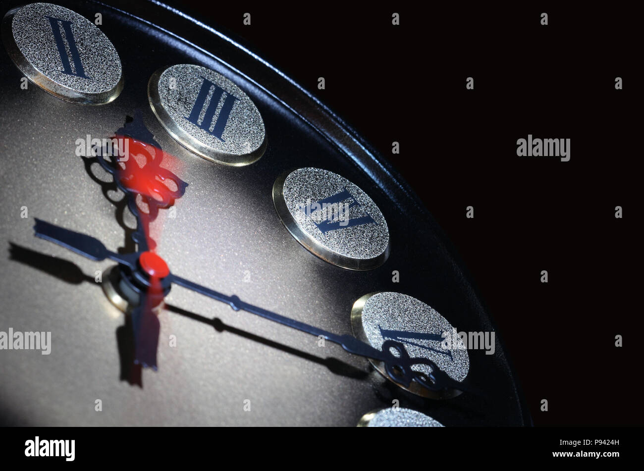 Closeup of clock dial on dark background with copy space Stock Photo ...