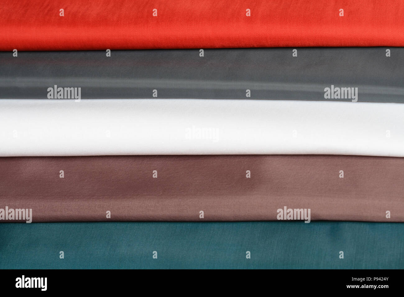 Background made from stack of various colored cloth Stock Photo - Alamy