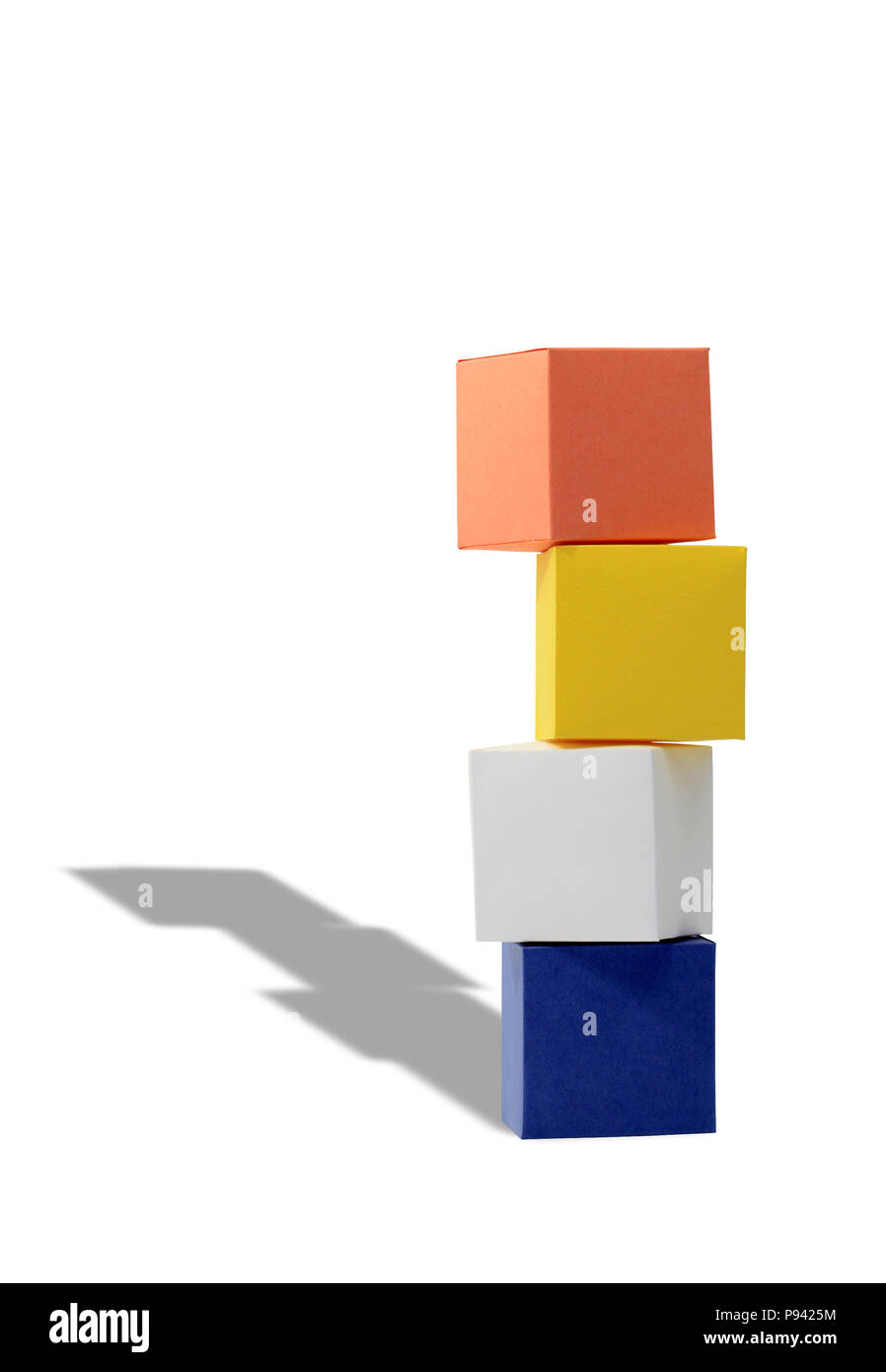 Vertical stack of colored cubes isolated on white background with ...