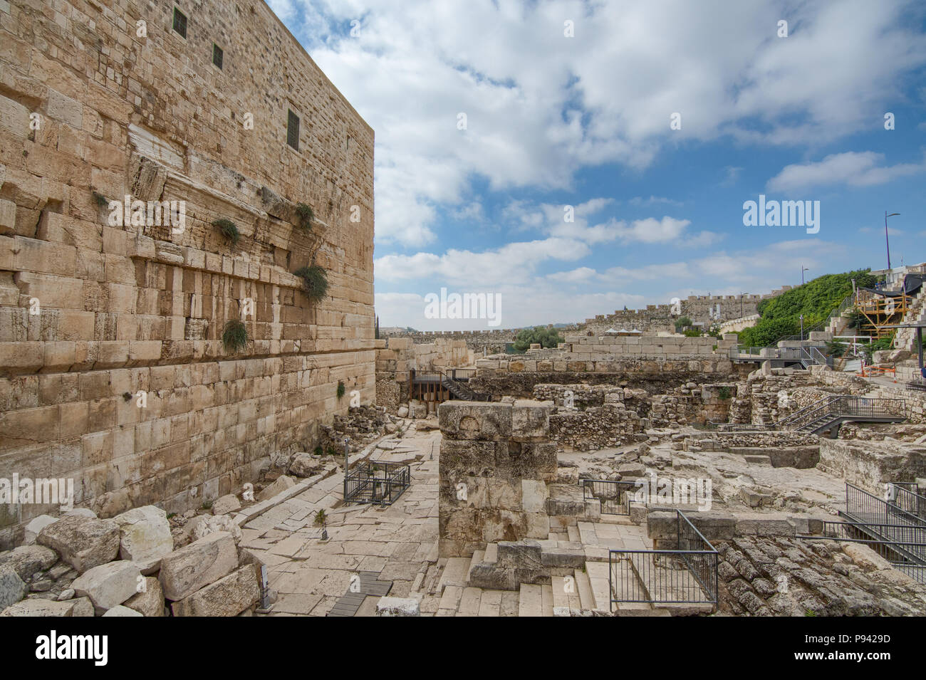 Western Wall ashlar stones and the remains of the Robinson's Arch ...