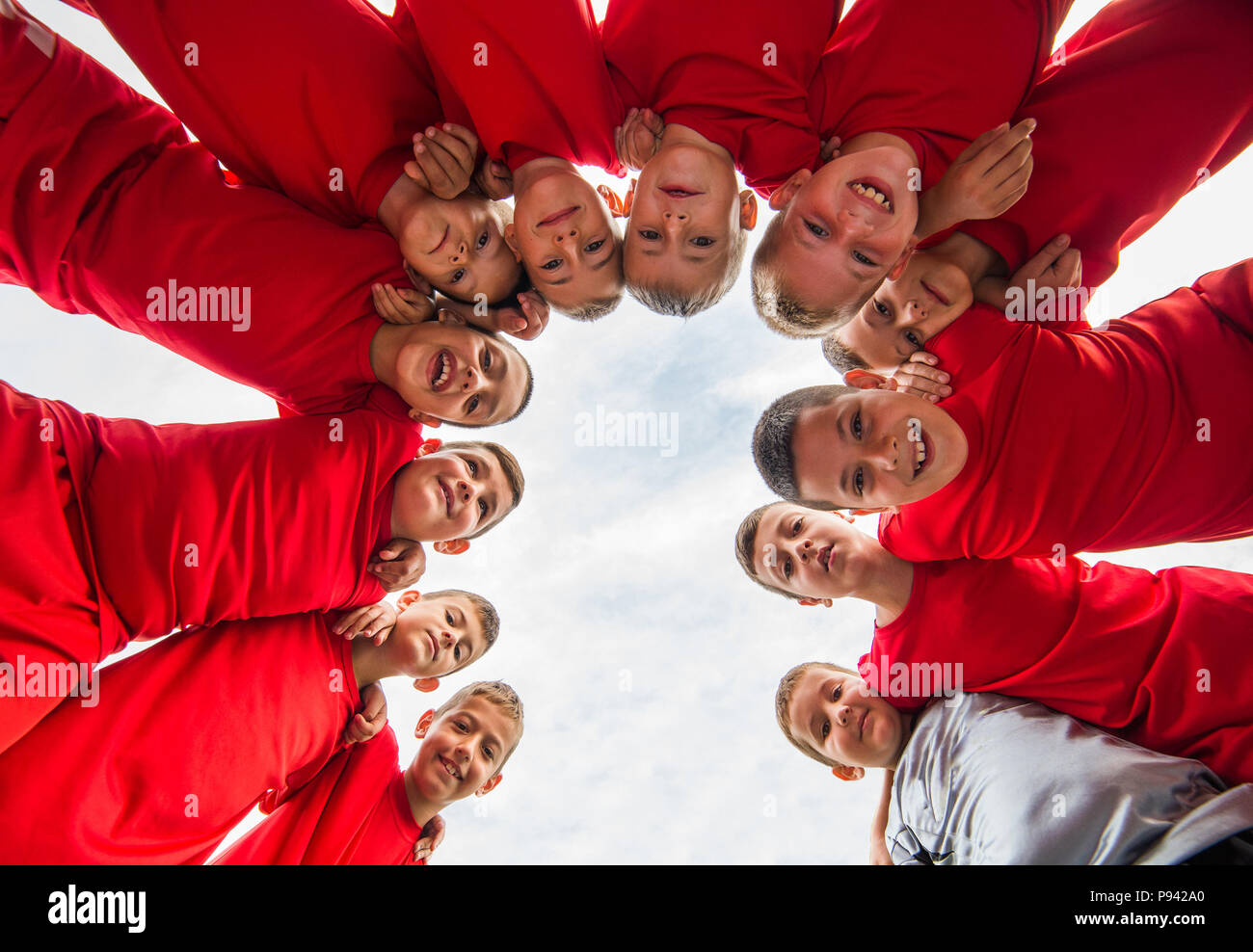 kids soccer team in huddle Stock Photo - Alamy