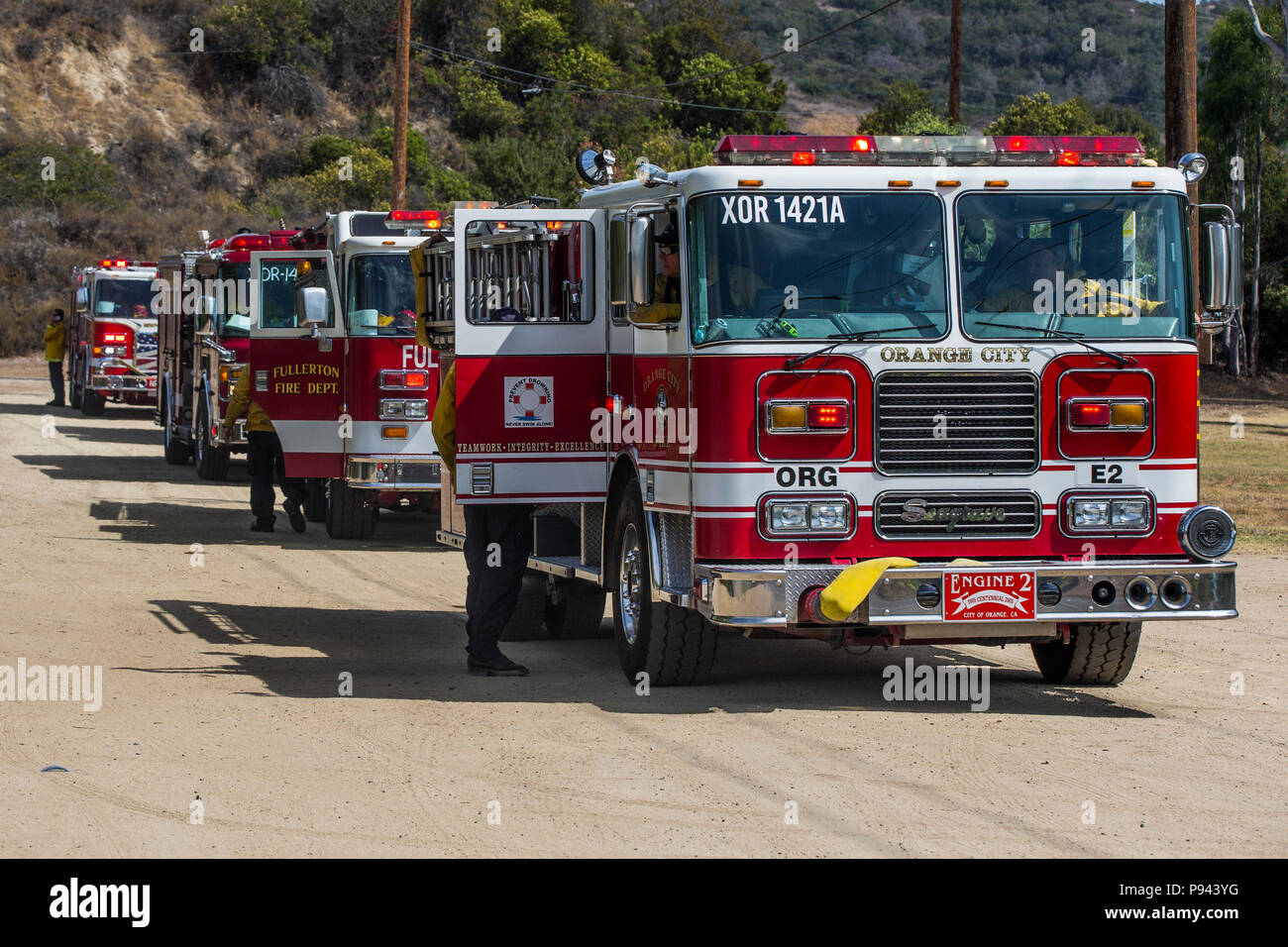 Firefighters with the Camp Pendleton Fire Department combat a fire in the Santa Margarita/De Luz ...