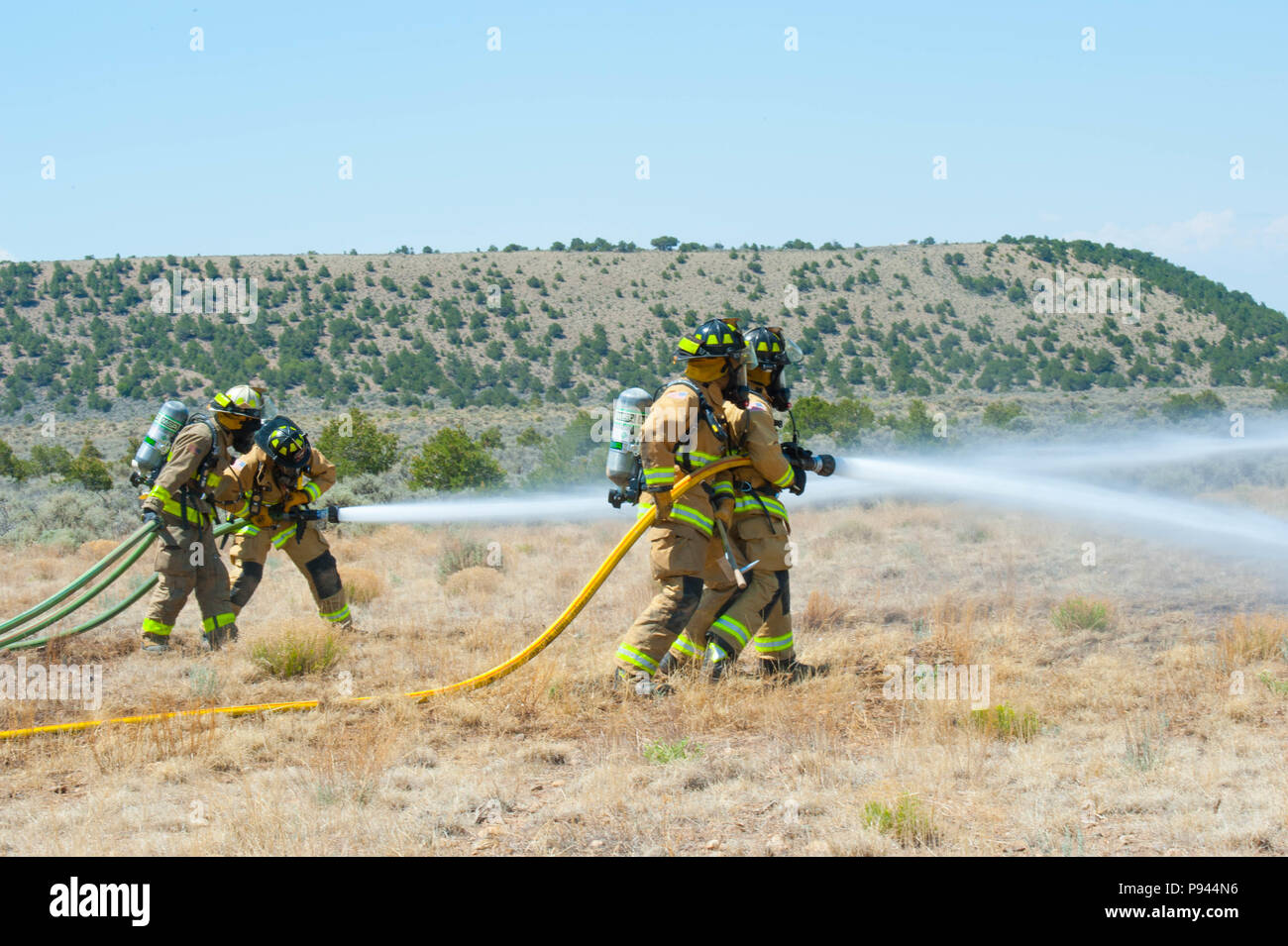 Aerial firefighters in fire trucks hi-res stock photography and images ...