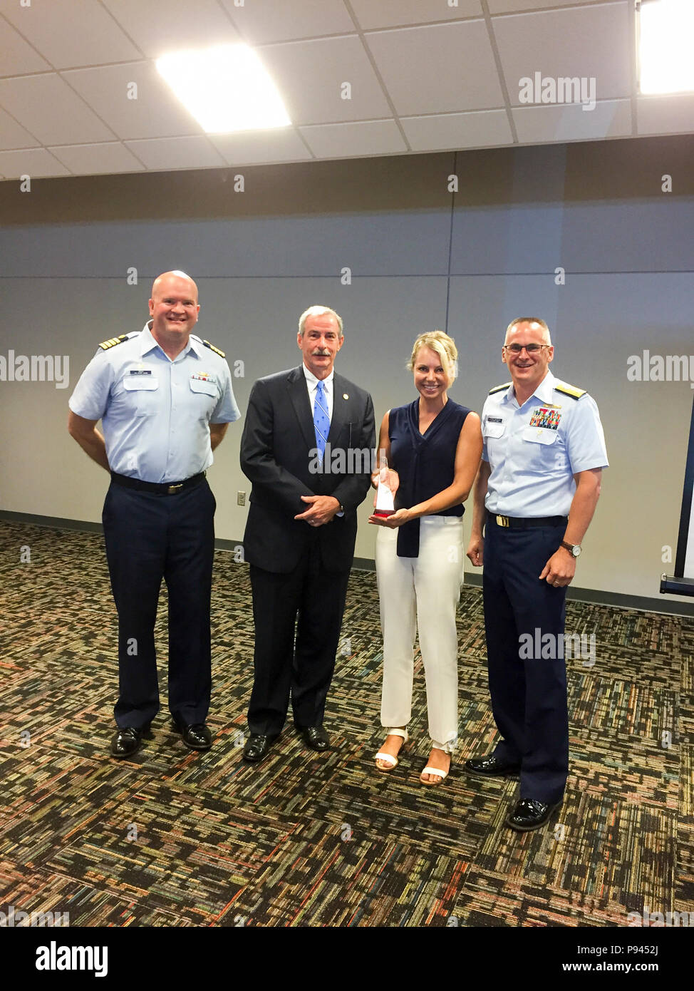 Capt. John Reed, left, Commanding Officer of Sector Charleston, Mark ...