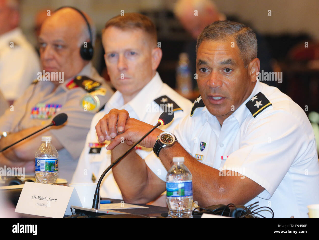(From right to left) Lt. Gen. Michael Garrett, commanding general, U.S ...