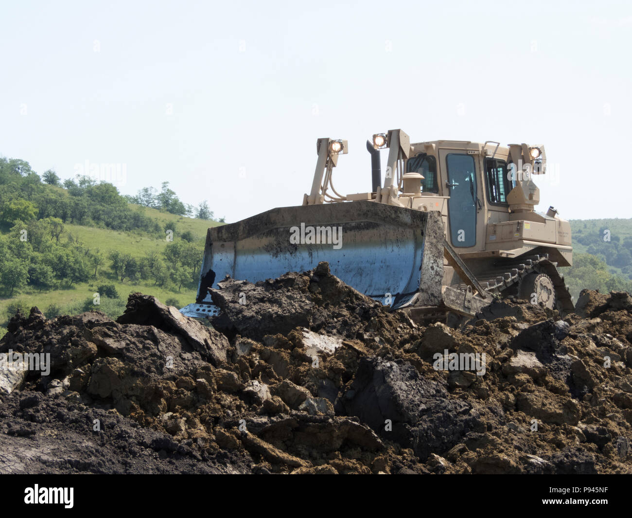 U.S. Army Reserves Spc. Justin Langley, a horizontal construction ...