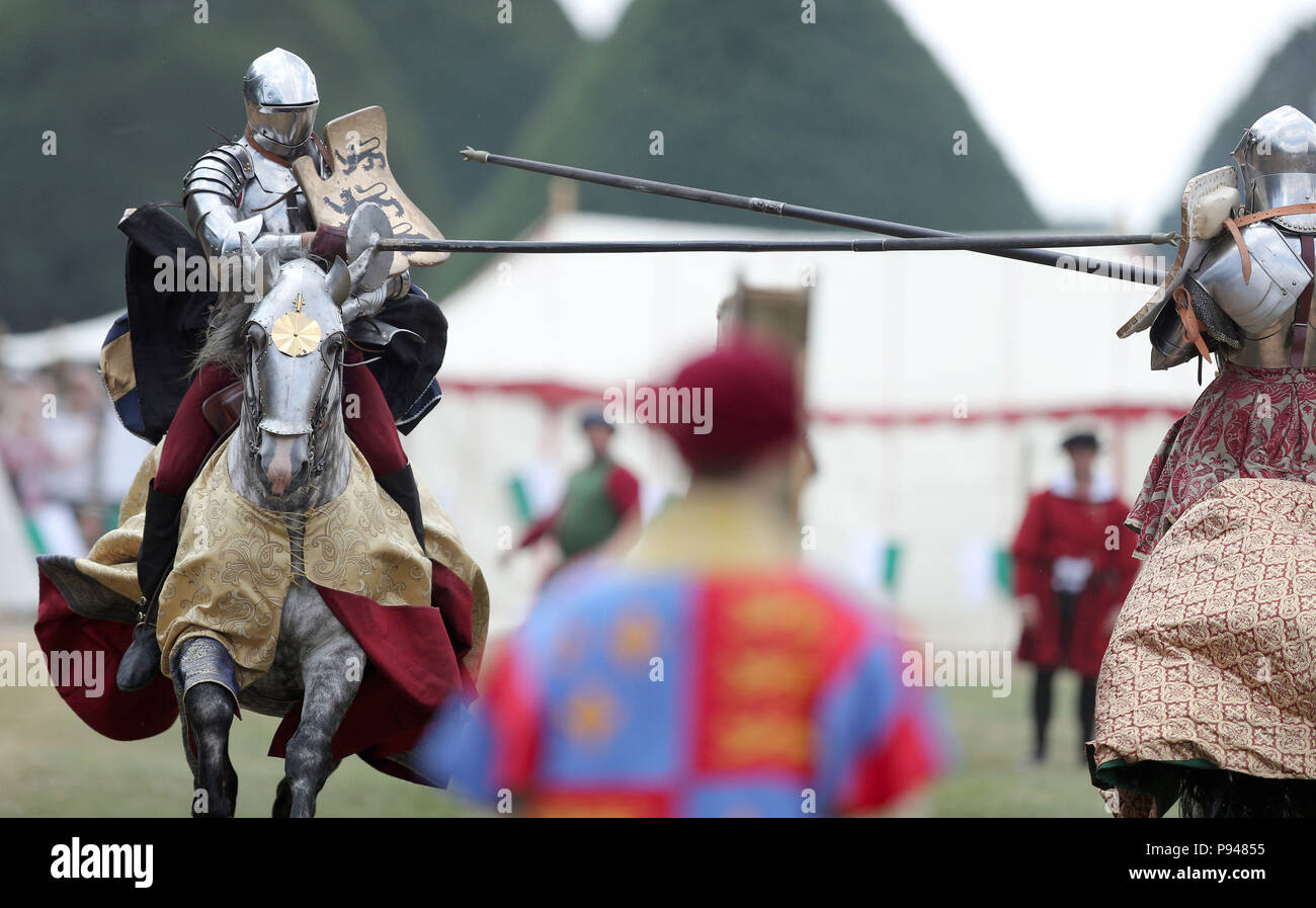 Knights joust during the Tudor Joust Weekend at Hampton Court Palace ...