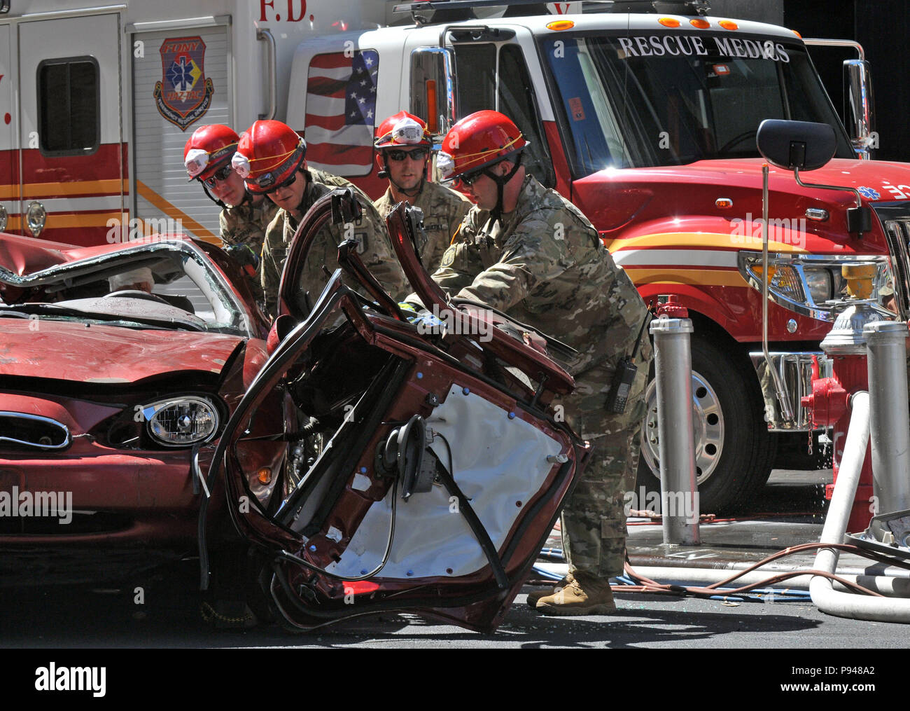 U.S. Army Reserve Spc. Corey Coffua, left, Spc. Robert Gryncewicz, Spc ...